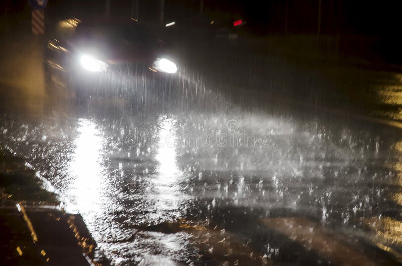 Car Goes at Night in the Rain Stock Photo - Image of street, headlight ...