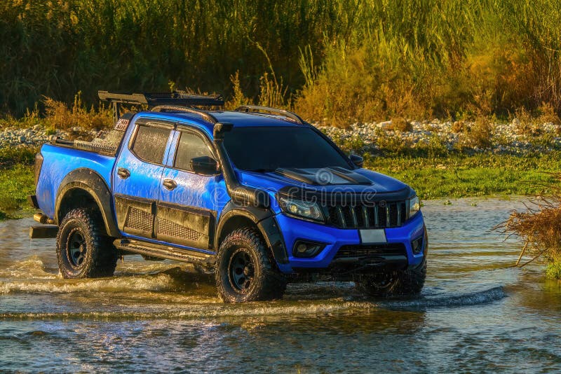 The Car Goes on the Water Near the Shore of a Lake. Stock Image - Image ...