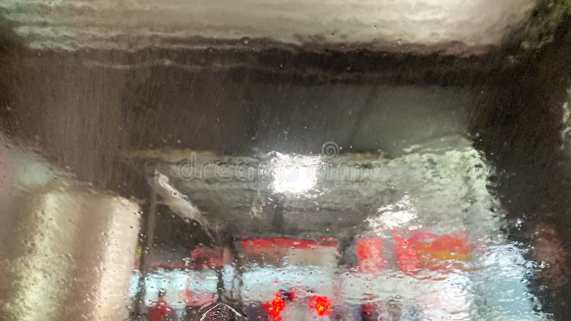 Car Going through Mechanical Car Wash at Fuel Station Stock Image ...