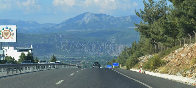A Car Going on the Road stock image. Image of tree, road - 150752109