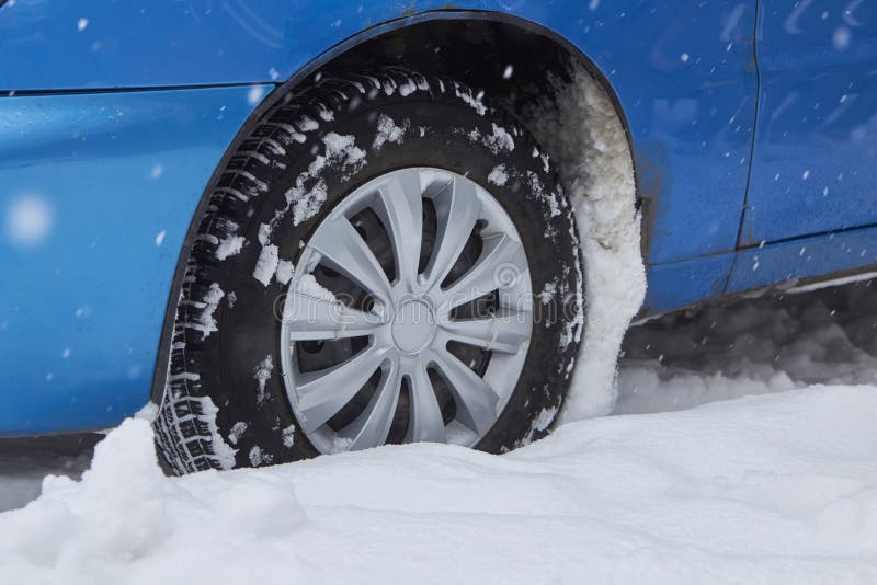 The Car Got Stuck in the Snow,a Car Wheel Stuck in Deep Snow Stock ...