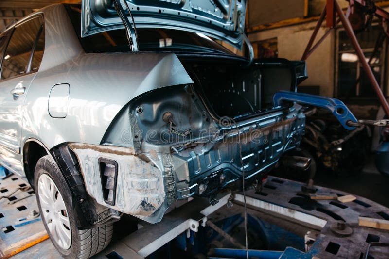 Car Has Dented Rear Bumper Damaged after Accident. Pulling Auto Body ...