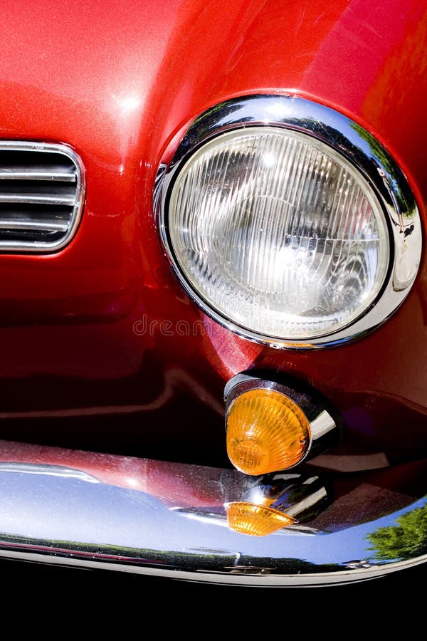 Antique red car head light stock image. Image of reflection - 2461271