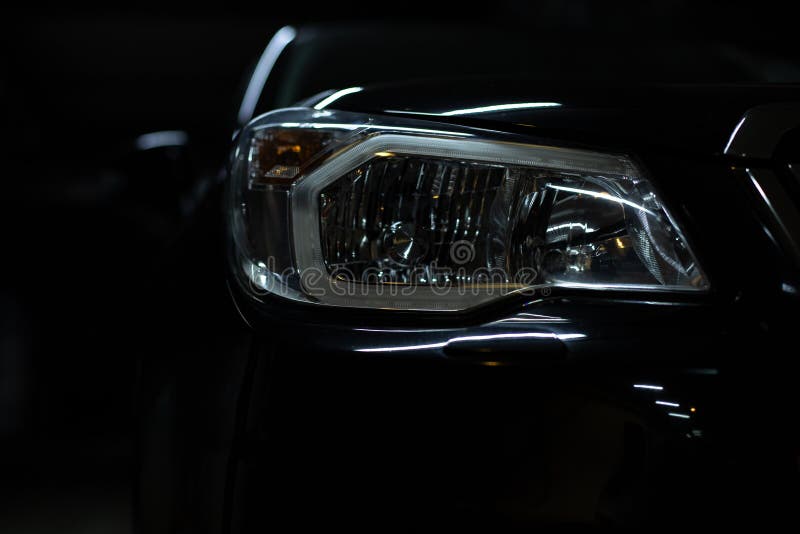 Car Headlight with Backlight. Exterior Detail.Yellow Color Luxury Car ...