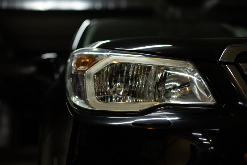 Car Headlight with Backlight on Black Background Stock Image - Image of ...