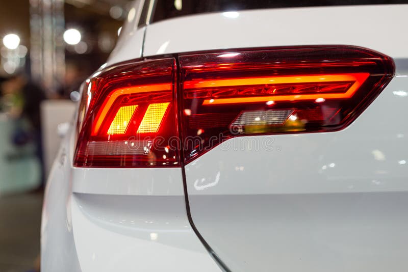 Car Headlight with Backlight. Exterior Detail.Dark Color Car - Image ...