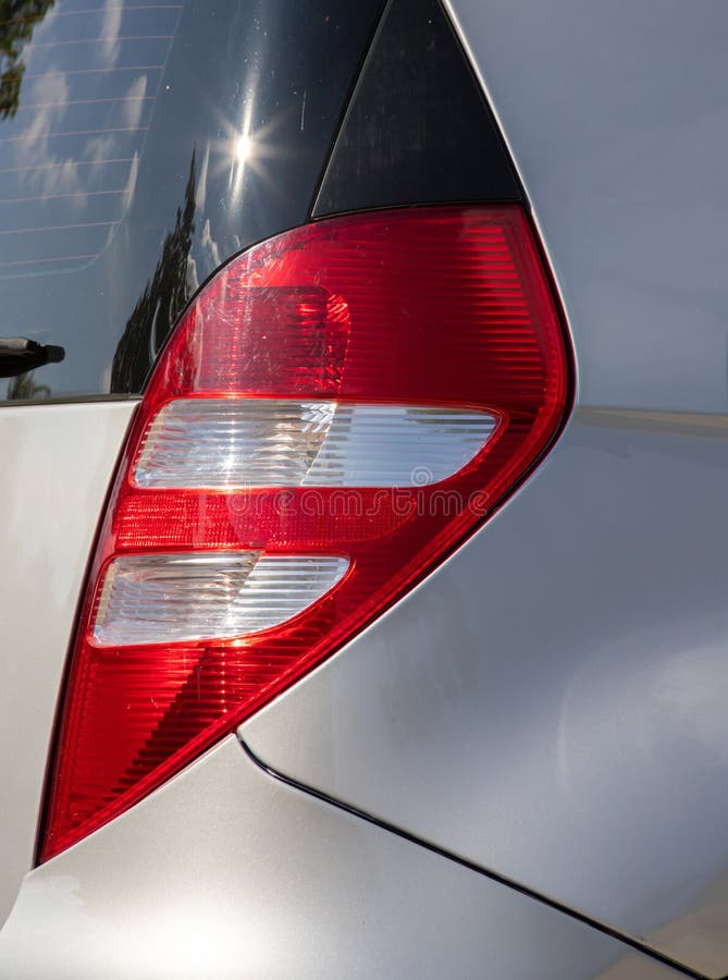 Car Headlight, Rear View. the Back of the Car and Part of the Way Stock ...