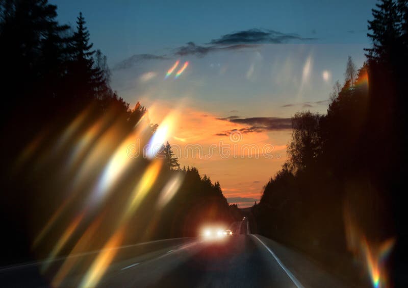 Car Headlights Glare on Windscreen Stock Image - Image of lamp, bright ...