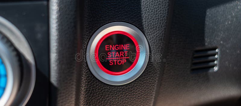 A Car Ignition Button or START Engine Inside Modern Electric Automobile ...