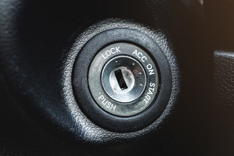 Car Ignition Lock Under the Steering Wheel in a Black Interior Stock ...