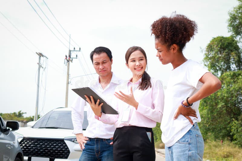 Car Insurance Agent Holding a Car Accident Claim Process Document Form ...