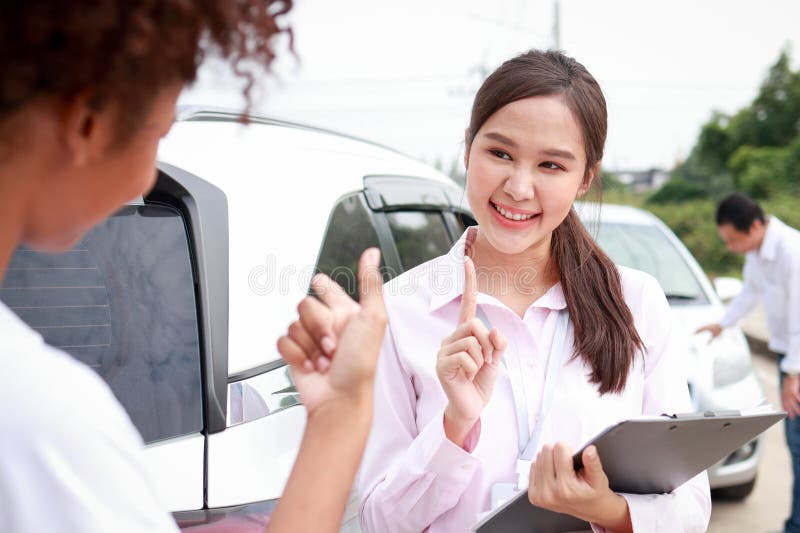 Car Insurance Agent Holding a Car Accident Claim Process Document Form ...