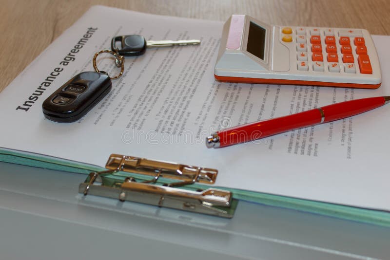 Car Insurance Form with Car Keys, Pen and Calculator on the Table Stock ...