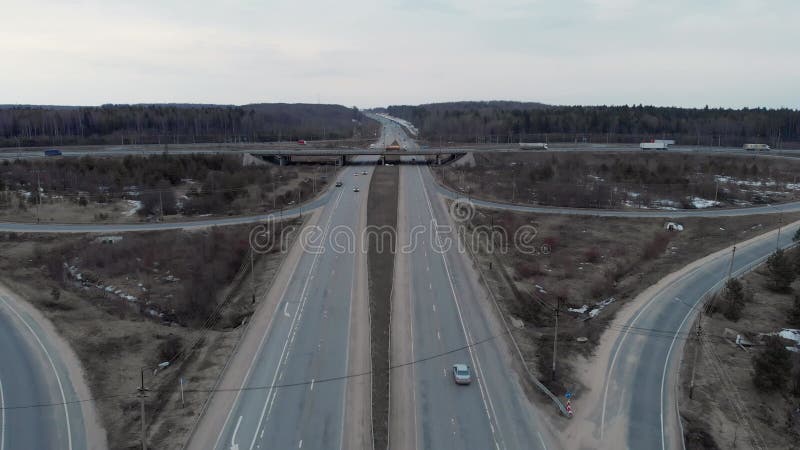 A Car Interchange with an Overpass on a Cloudy Spring Evening in the ...