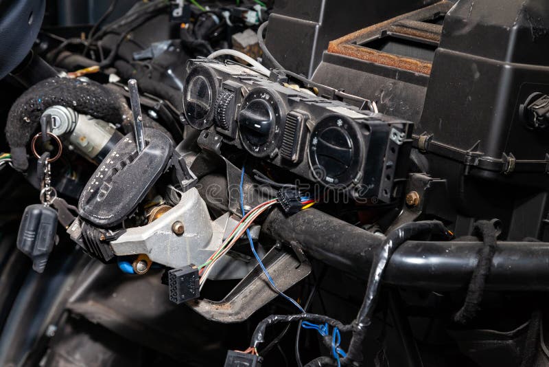 Car Interior in the Back of a Van with a Disassembled Dashboard and ...