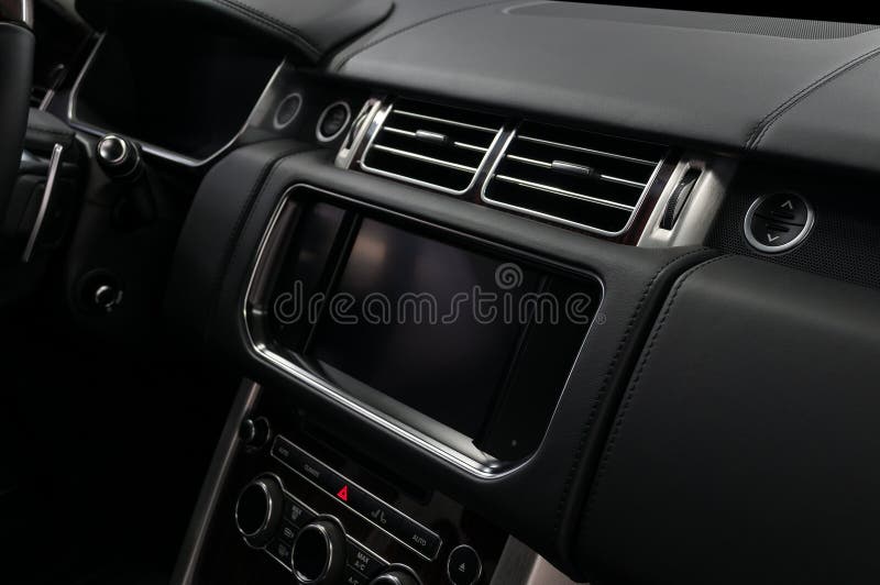 Car Interior Detail. Panel with Multimedia Screen, Control Buttons and ...