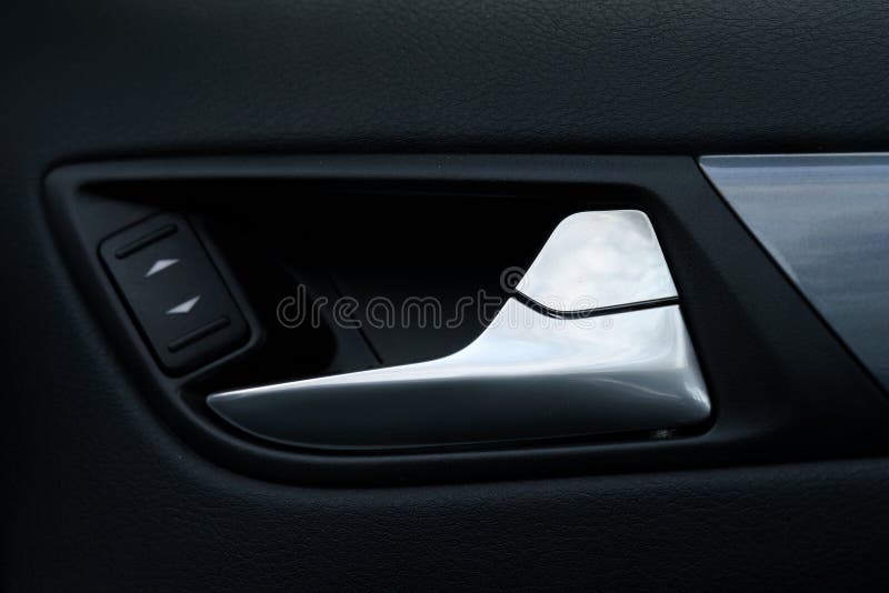 Car Interior Door Handle with Controls for Electric Windows Stock Photo ...