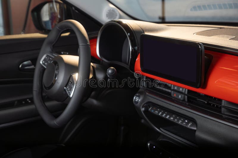 Car Interior Featuring a Vibrant Red Dashboard with a Touchscreen ...