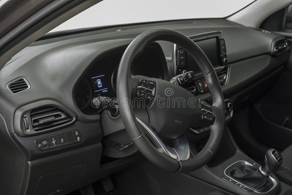 Car Interior with a Steering Wheel, Control Buttons and Manual Shift ...