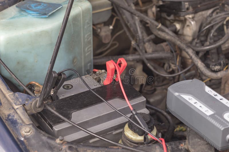 Car with Internal Combustion Engine. the Hood is Open and the Battery ...