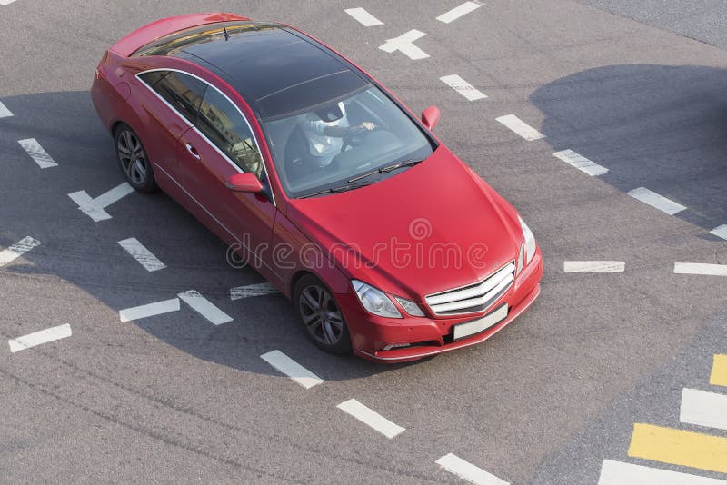 Car at Intersection with Marking Stock Photo - Image of long, town ...