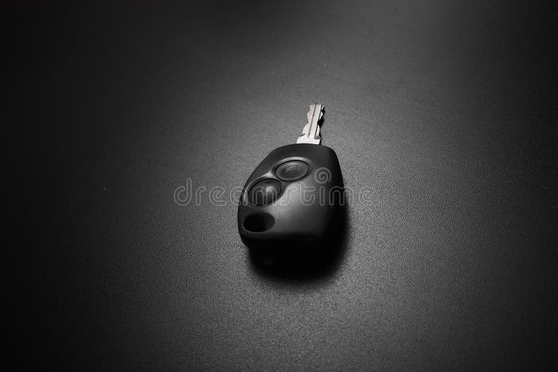 Car Key with Central Lock on Black Background. Stock Image - Image of ...