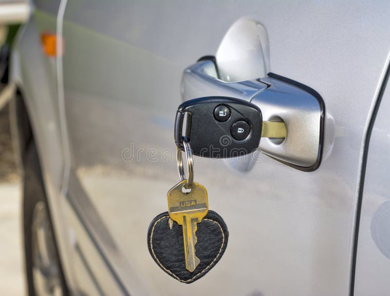 Car Key in the Door of an SUV Stock Photo - Image of heart, handle ...