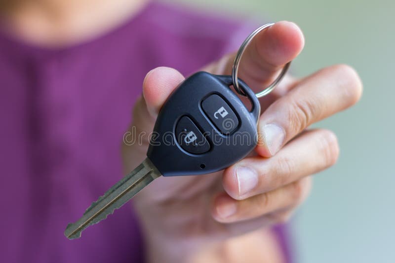 Car key in man hand stock image. Image of giving, electronic - 52315199