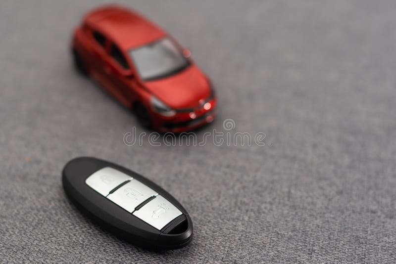 Car Key and Toy Car. Automobile Security Accessories Stock Photo ...