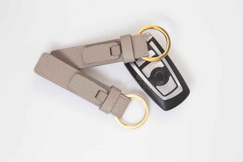 Car Key with Wireless Remote and Leather Chain on White Background ...