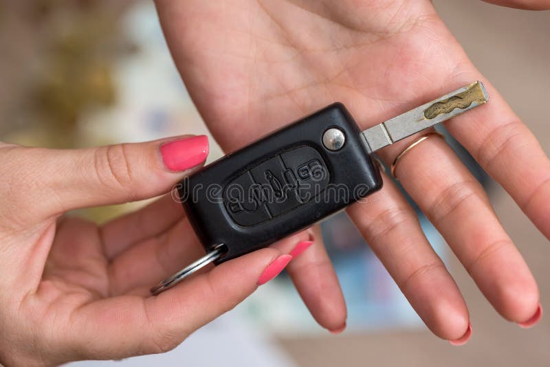 Car key in hand stock image. Image of security, woman - 109275275