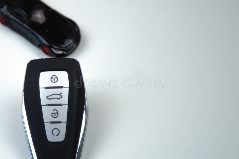The Car Keys are Black with Metal Inserts and Automatic Opening and ...