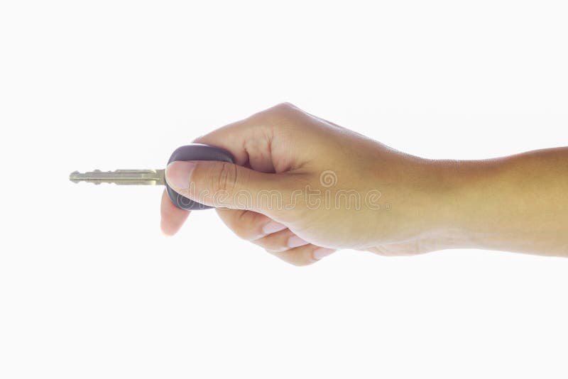Hand holding car keys stock photo. Image of buttons, locked - 35138364