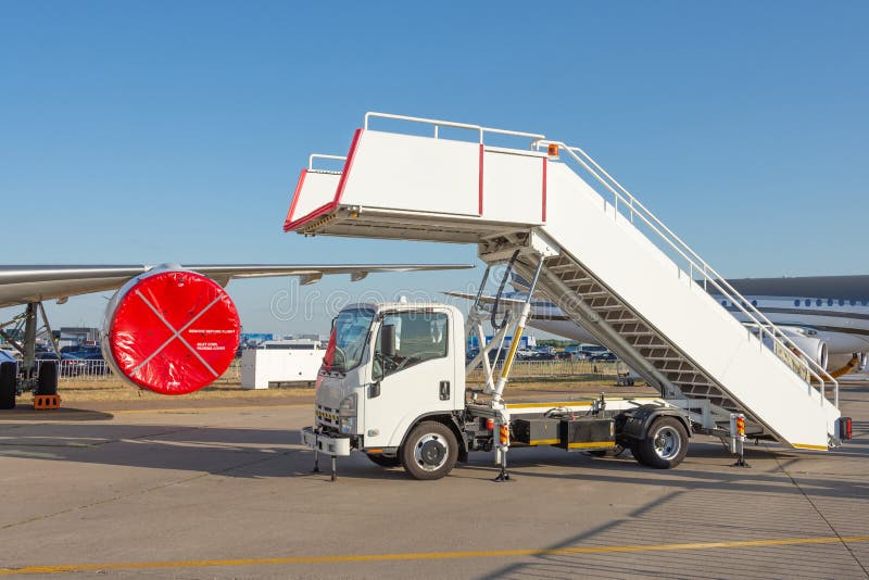 Plane Ladder Connected To Airplane and Ready To Pass People at the ...