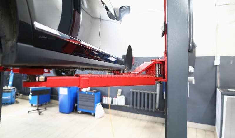 Car is on Lift in Car Service Closeup Stock Photo - Image of technology ...
