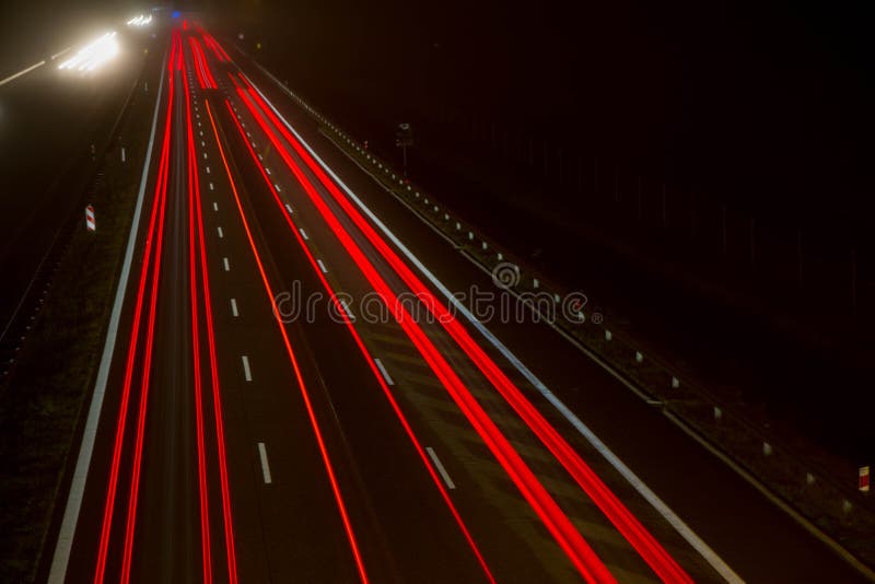 Car light trails at night stock photo. Image of drive - 260346252