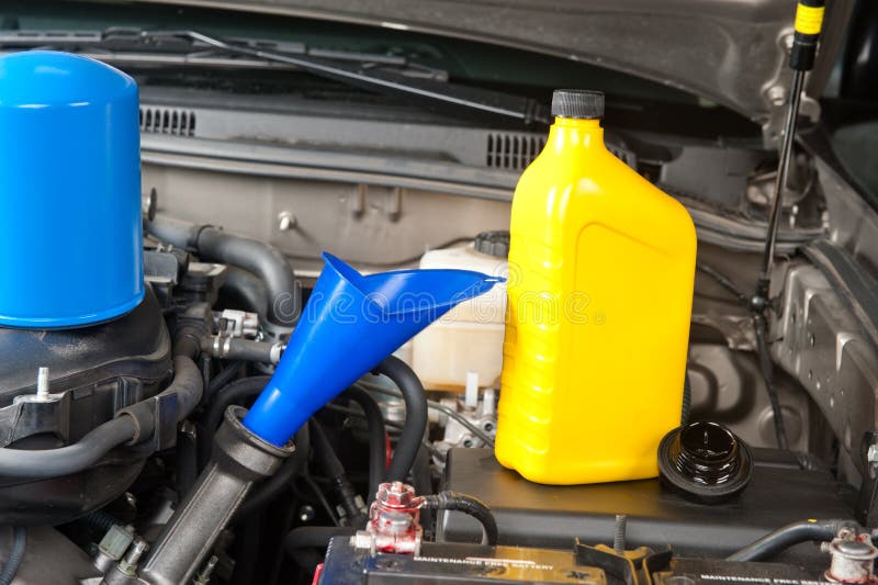 Car maintenance oil change stock photo. Image of spout - 16460776