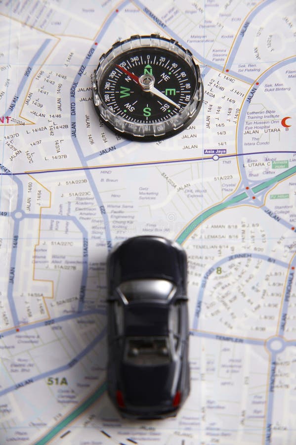 Car,map and compass stock image. Image of east, scout - 7515551