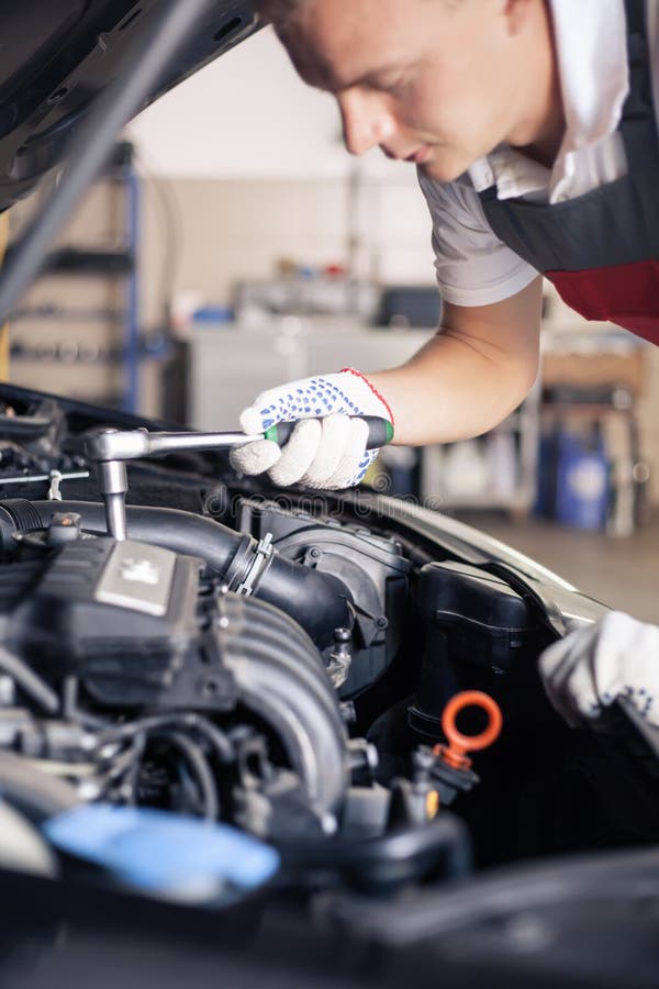 Portrait of a mechanic stock image. Image of order, person - 66845797
