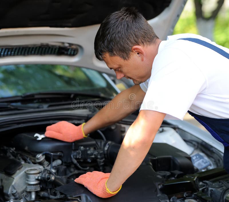 Car Mechanic Working in Auto Repair Service. Stock Image - Image of ...