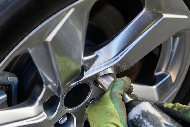 Car Mechanic Changing Wheels in Car Stock Image - Image of mechanic ...