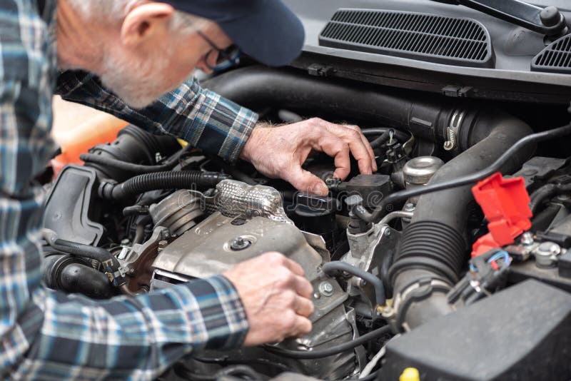 Car Mechanic Working on Car Engine Stock Image - Image of checking ...