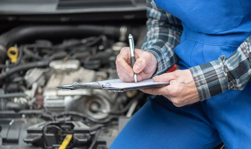 Car Mechanic Checking a Car Engine Stock Image - Image of automotive ...