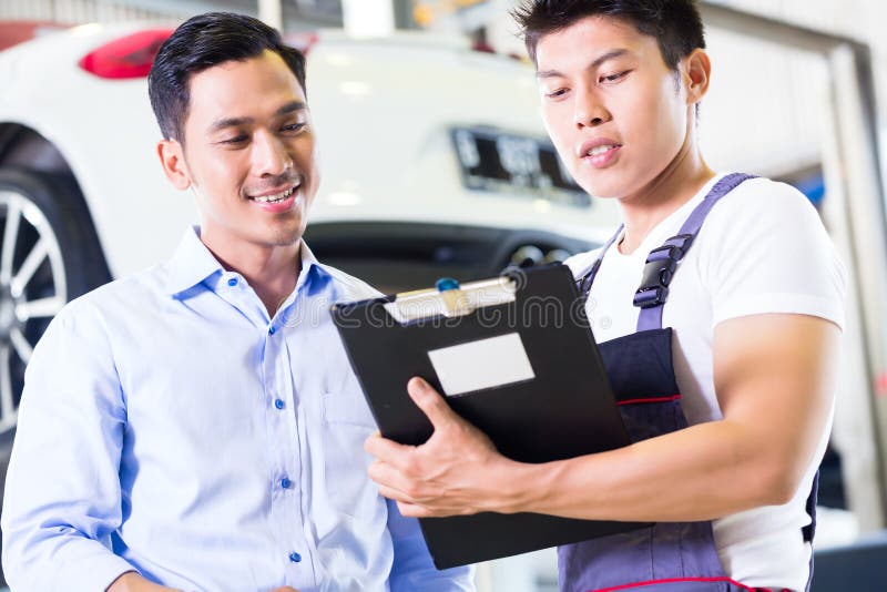 Car Mechanic and Customer in Asian Auto Workshop Stock Photo - Image of ...