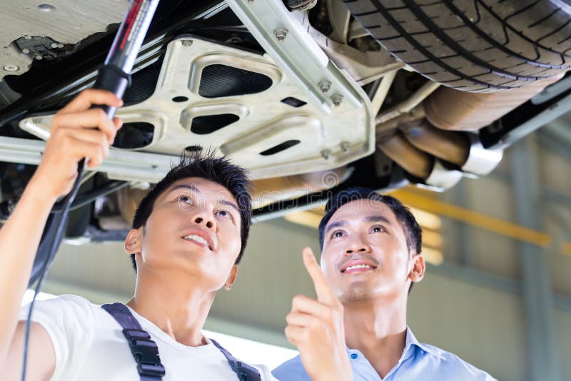 Car Mechanic and Customer in Asian Auto Workshop Stock Photo - Image of ...