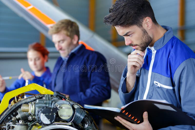 Car Mechanic Man Thinking at Garage Fixing Engine Stock Photo - Image ...