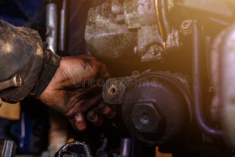 Car Mechanic Servicing Car Engine in Car Service Closeup Stock Photo ...