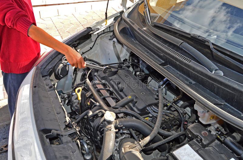 A Car Mechanic with a Spanner Stock Image - Image of group, greasy ...