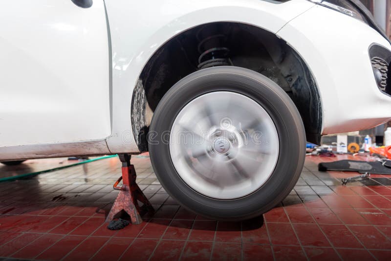 Car Mechanic Testing the Brake on Car Wheel Stock Image - Image of ...