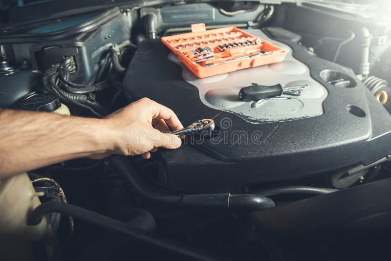 Car Mechanic Using Socket Wrench Stock Photo - Image of worker, people ...